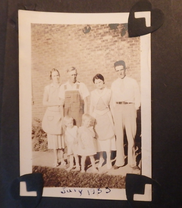 Page 62. July 1933: Dorothy and Jack with unknown relatives.